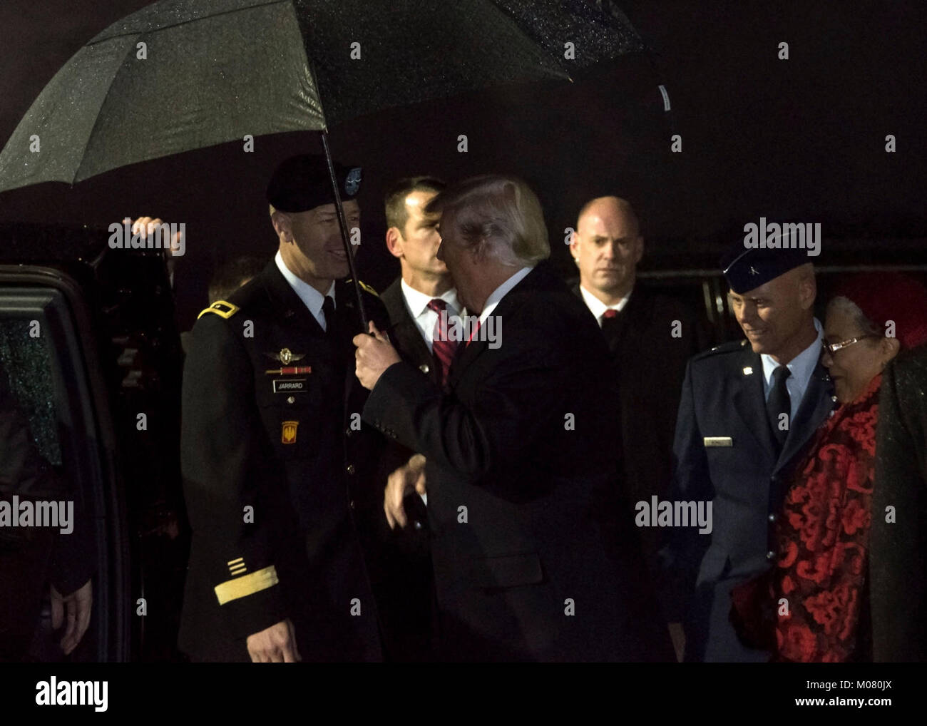 President Donald Trump speaks to Maj. Gen. Joseph Jarrard, the adjutant ...