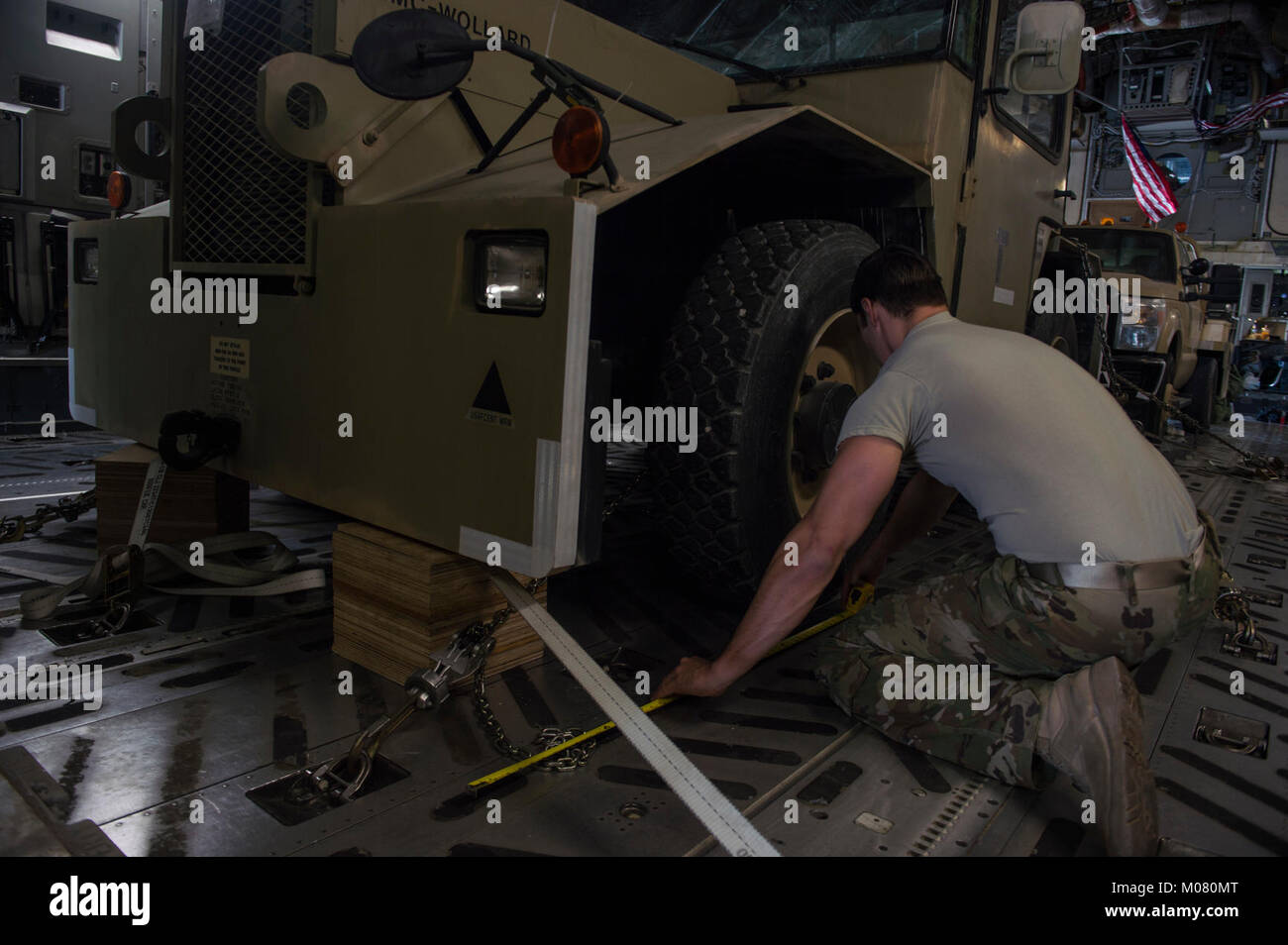A U.S. Air Force C-17 Globemaster III loadmaster, assigned to the 816th ...