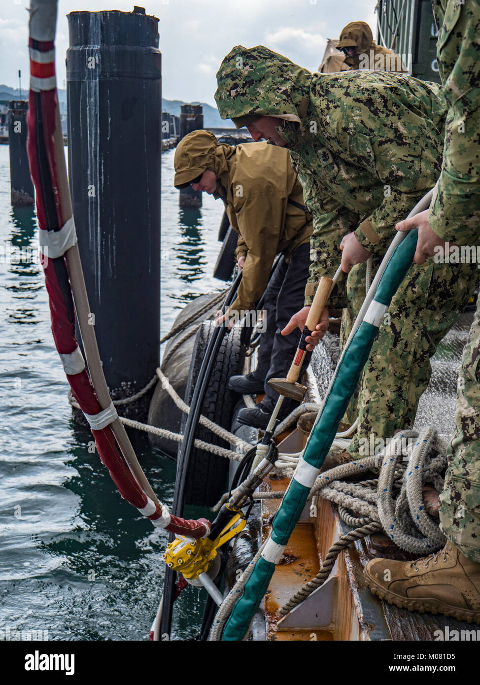 U.S. Navy Seabees, assigned to Underwater Construction Team (UCT) 2 ...