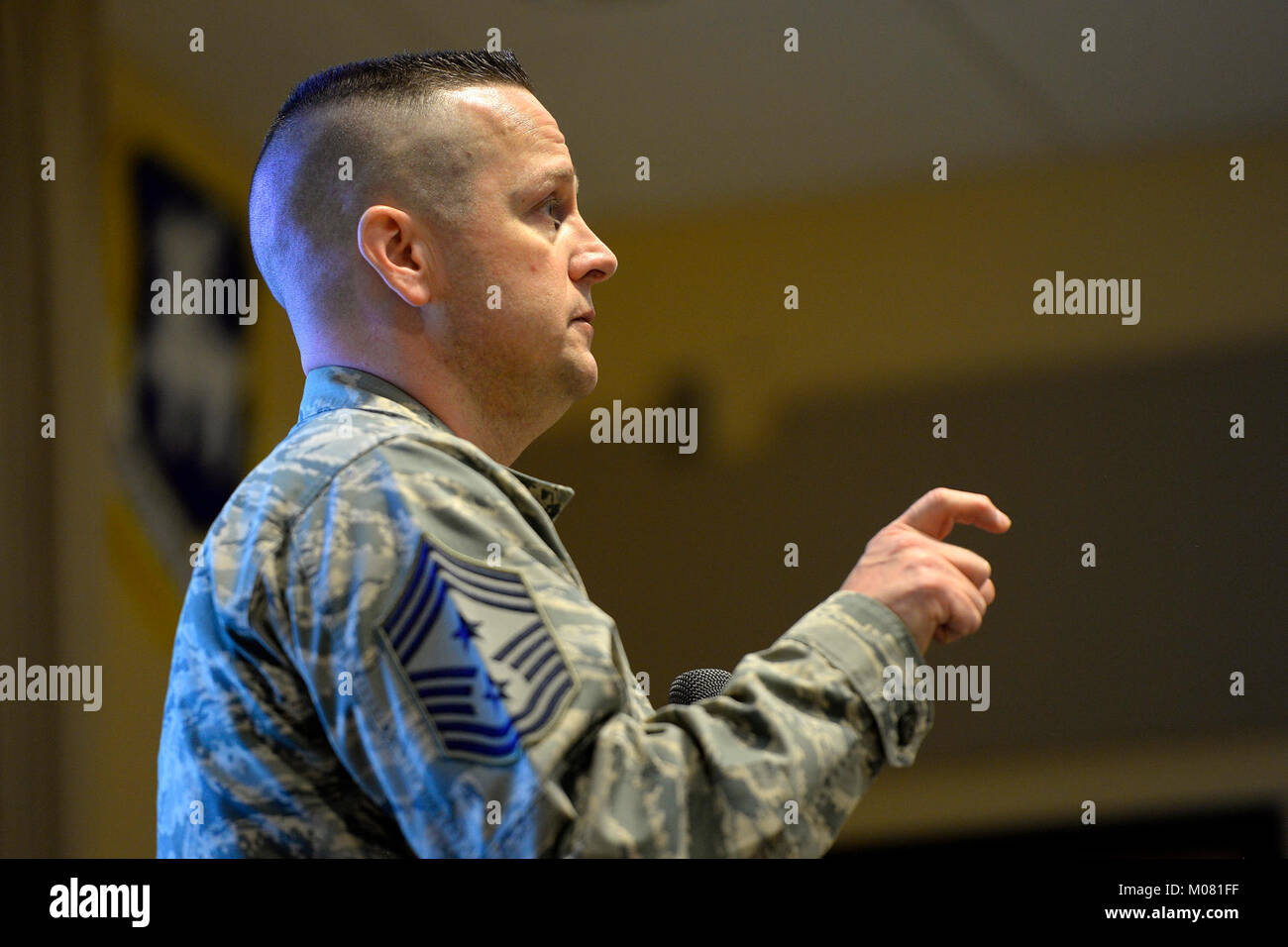 Chief Master Sgt. Jason Tiek, 50th Space Wing command chief, speaks to ...
