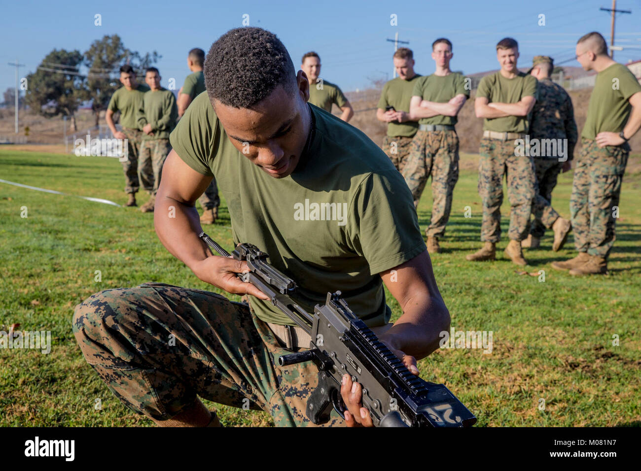 A U.S. Marine with 11th Marine Regiment, 1st Marine Division, assembles ...