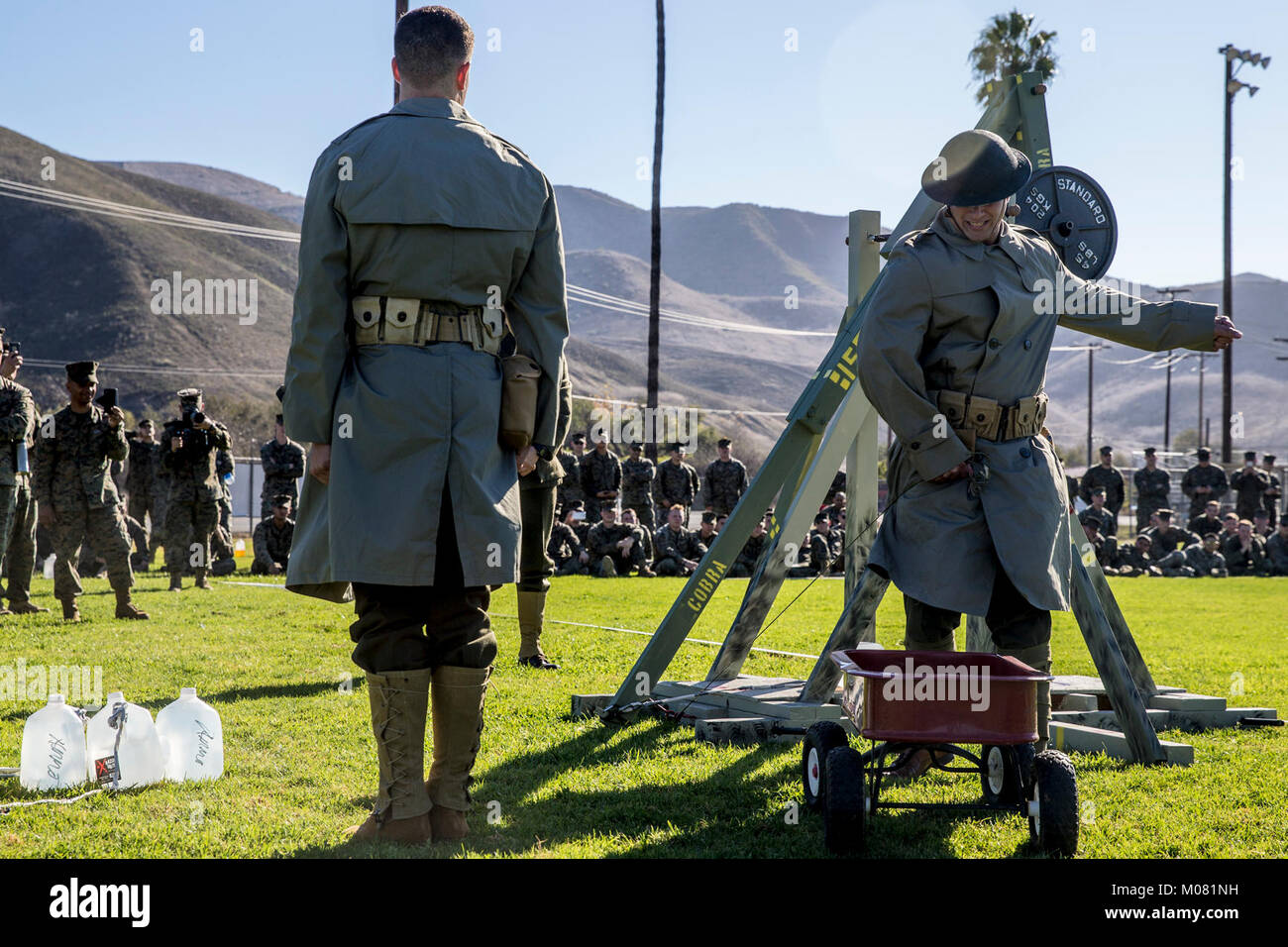 U.S. Marines with 11th Marine Regiment, 1st Marine Division, fire a ...