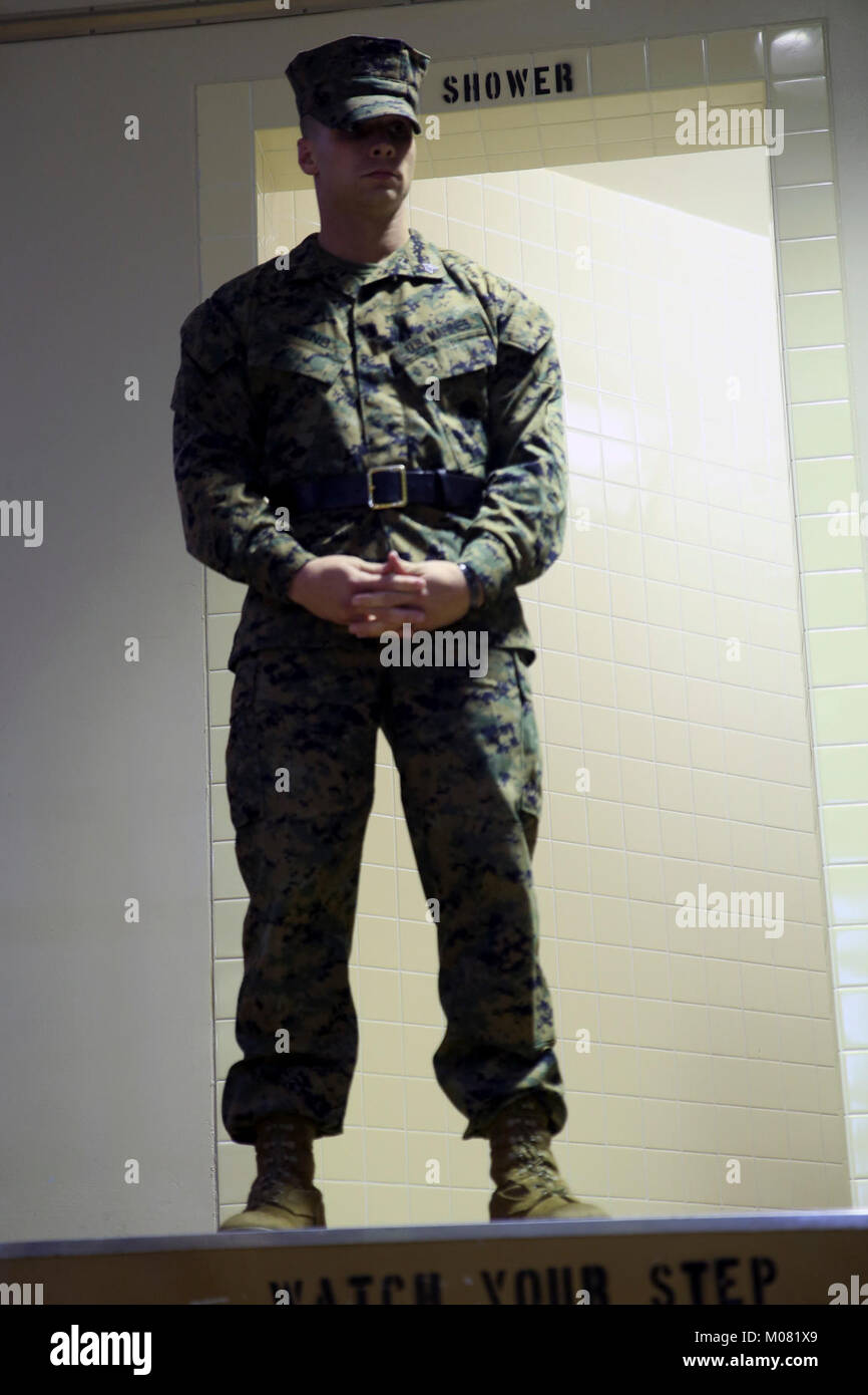 CAMP HANSEN, OKINAWA, Japan – Sgt. Dustin Owens observes awardees ...