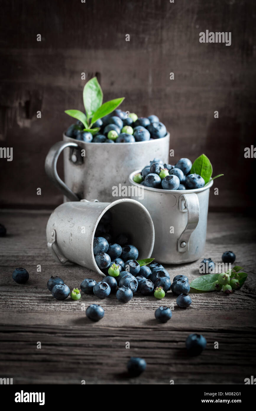 Closeup of healthy blueberry on old wooden rustic floor Stock Photo - Alamy