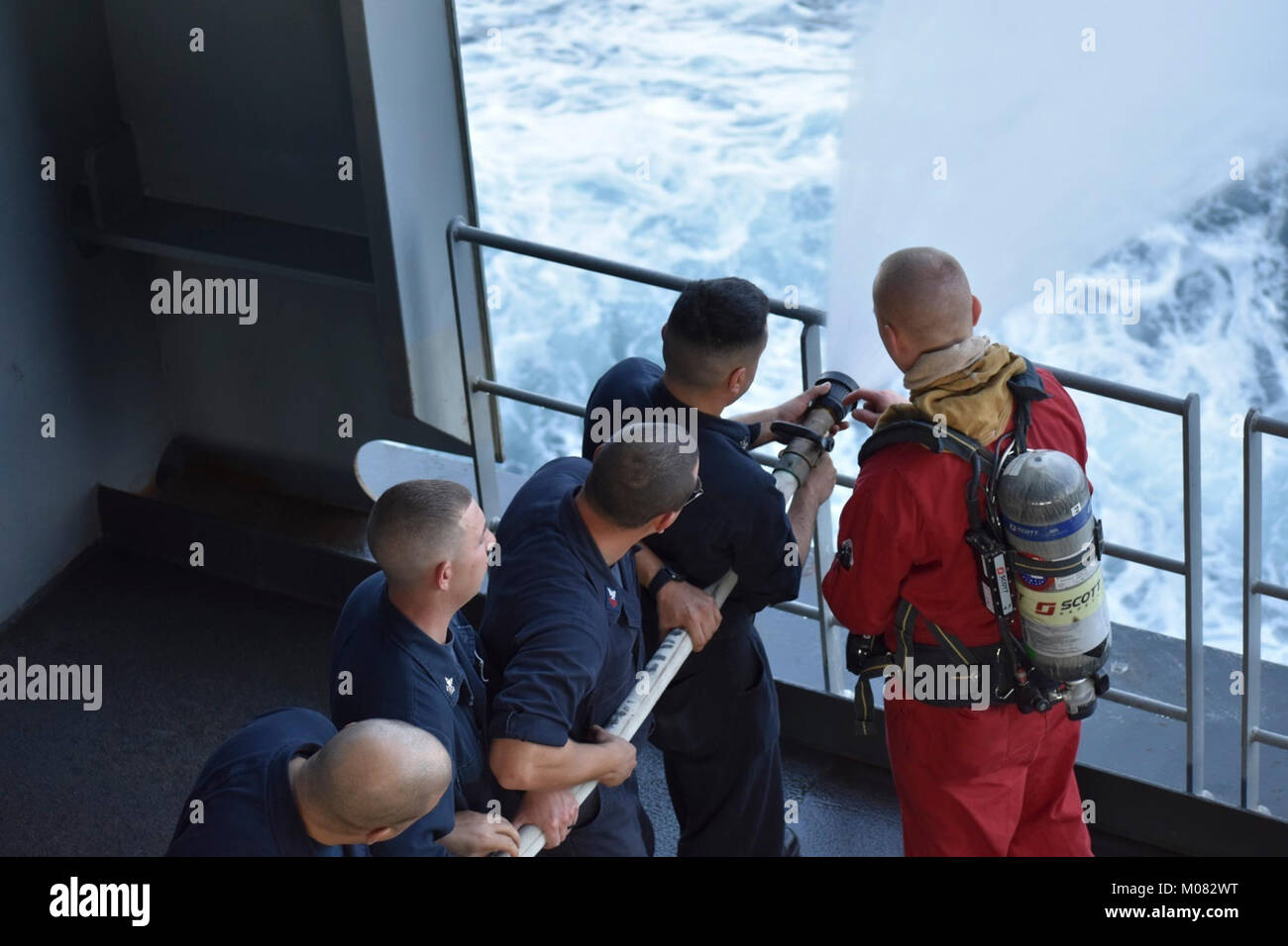 Firefighting hose handling techniques hi-res stock photography and ...