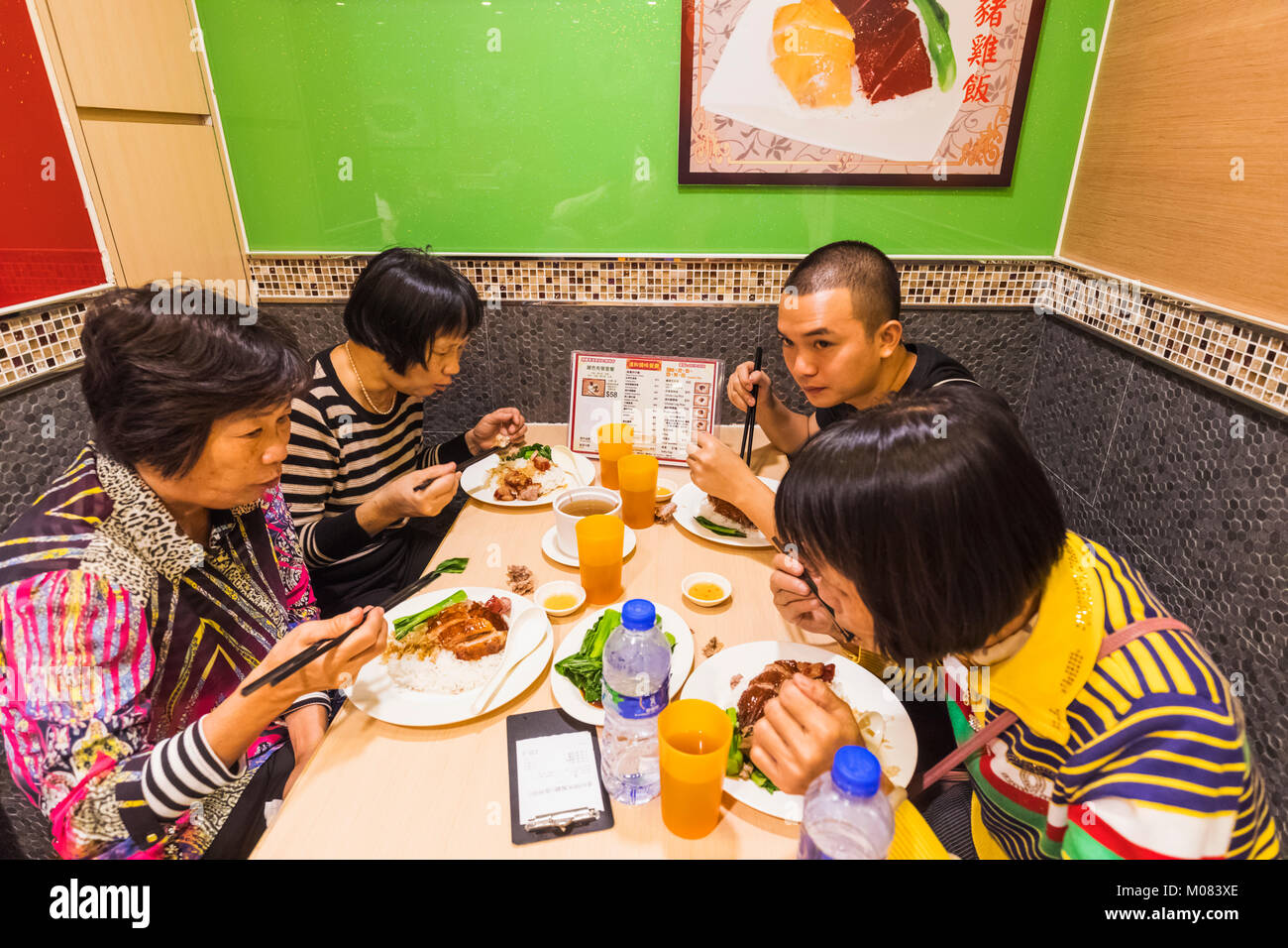 China, Hong Kong, Group of People Eating Rice and Duck Stock Photo - Alamy