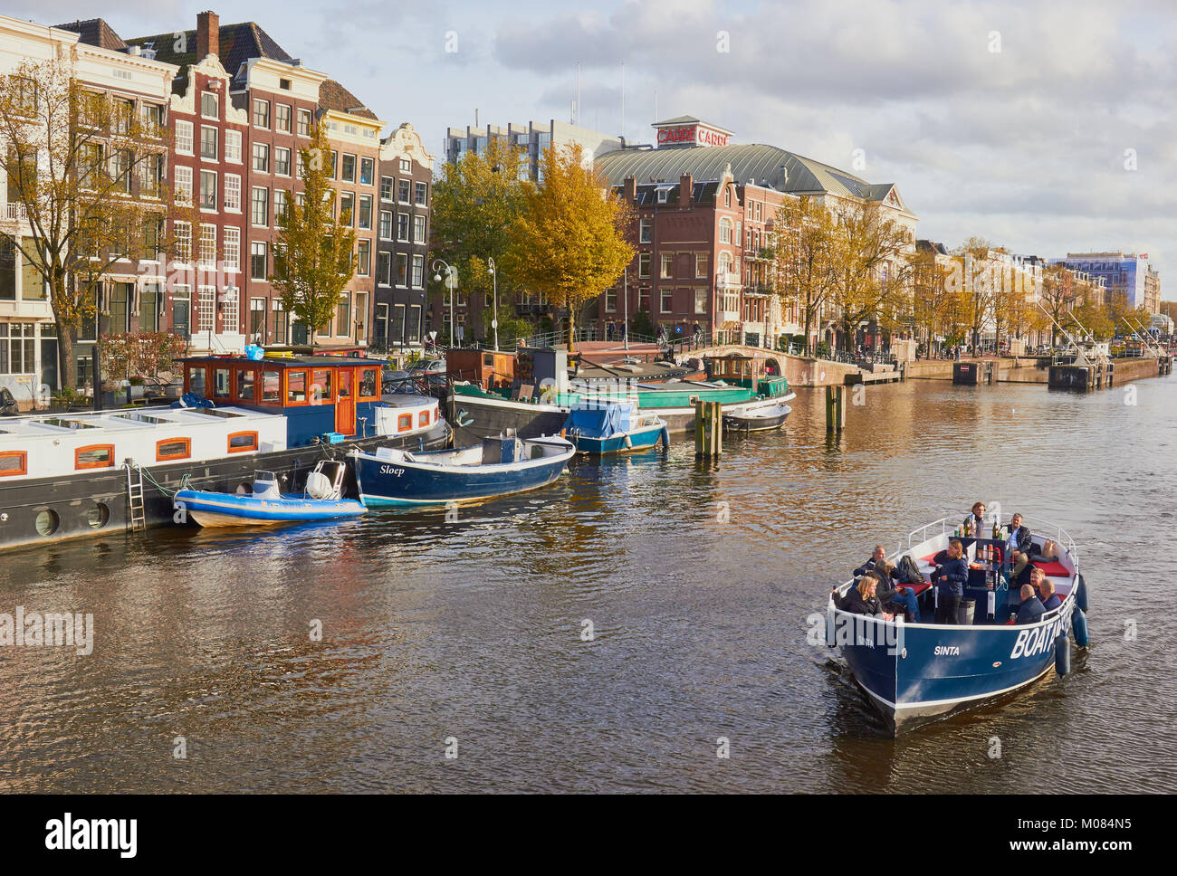 Boat tour on the Amstel river, Amsterdam, Netherlands Stock Photo - Alamy