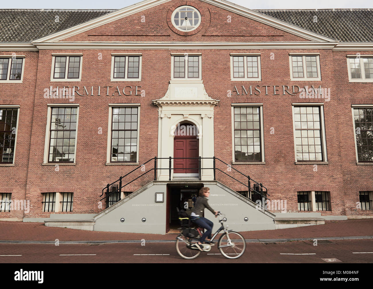 Cyclist passing Hermitage Museum, Amsterdam, Netherlands, Located in ...