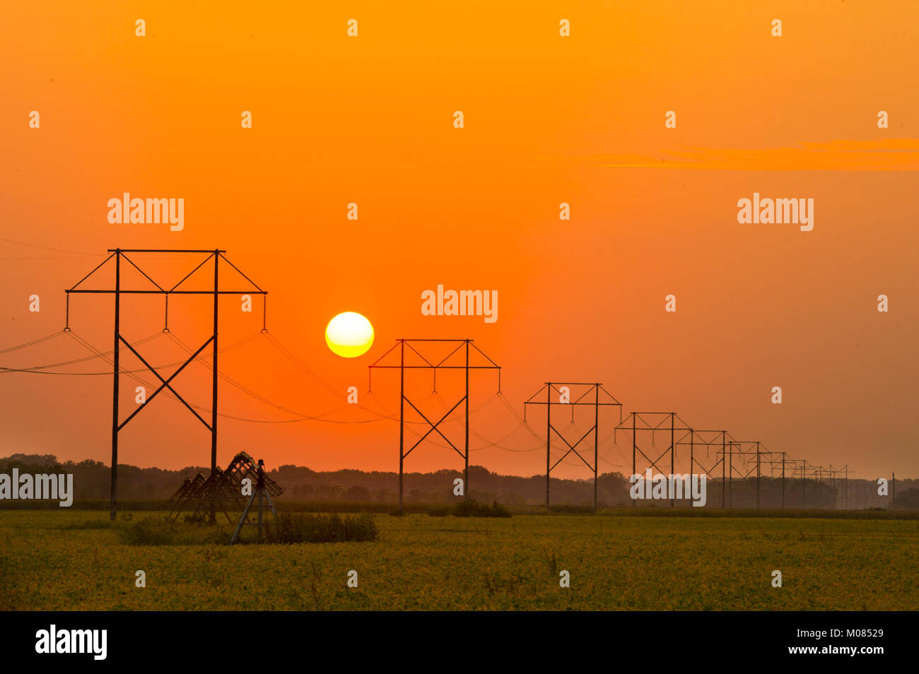 Power lines during sunset outside of North English, Iowa, Sept. 13 ...