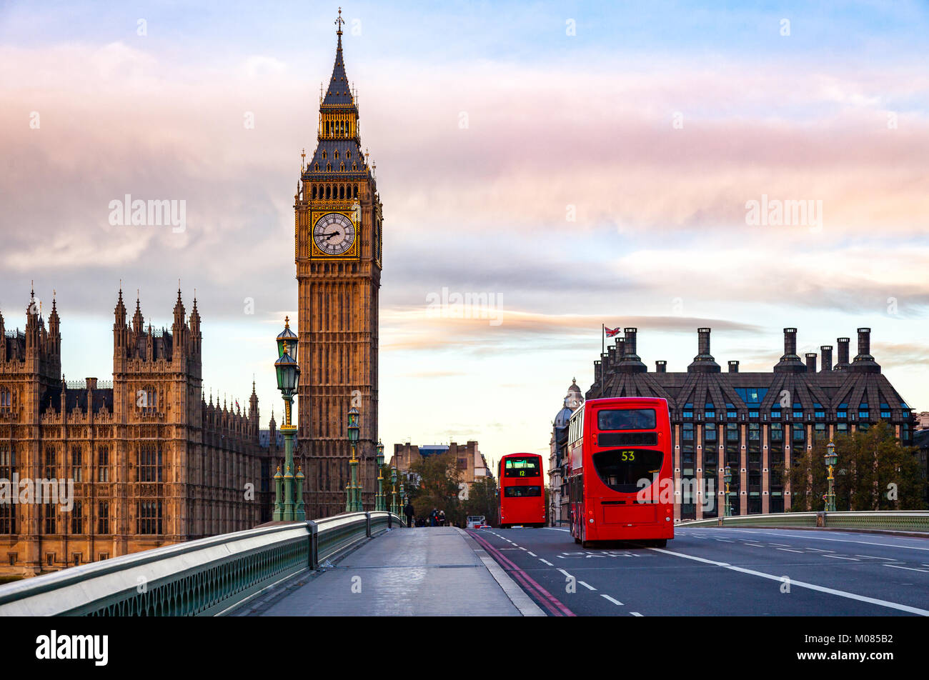 London morning traffic scene with red Double Decker buses move along ...
