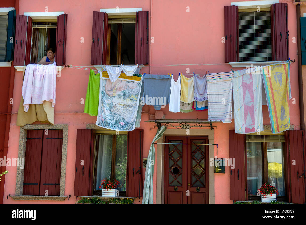 The Island of Burano near Venice, Italy, famous for its pretty multi ...
