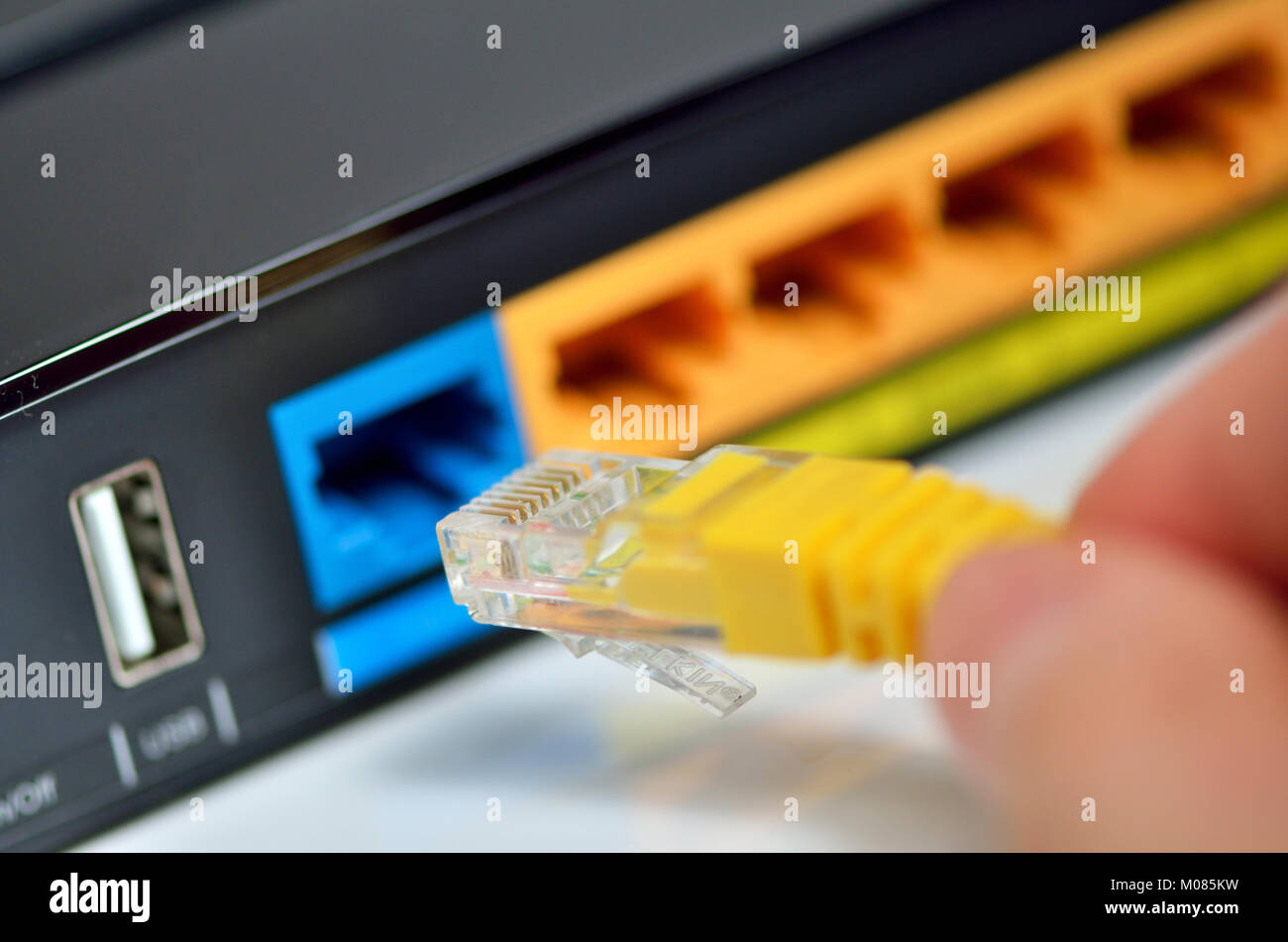 Man hand plugging hi-res stock photography and images - Alamy