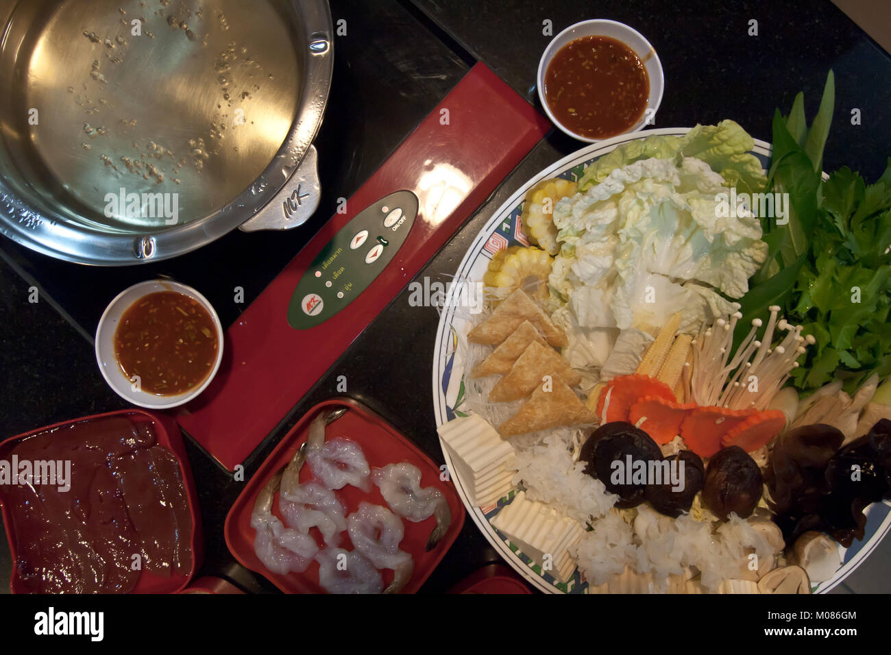 Raw food elements ready to be boiled and cooked, Chinese restaurant in ...