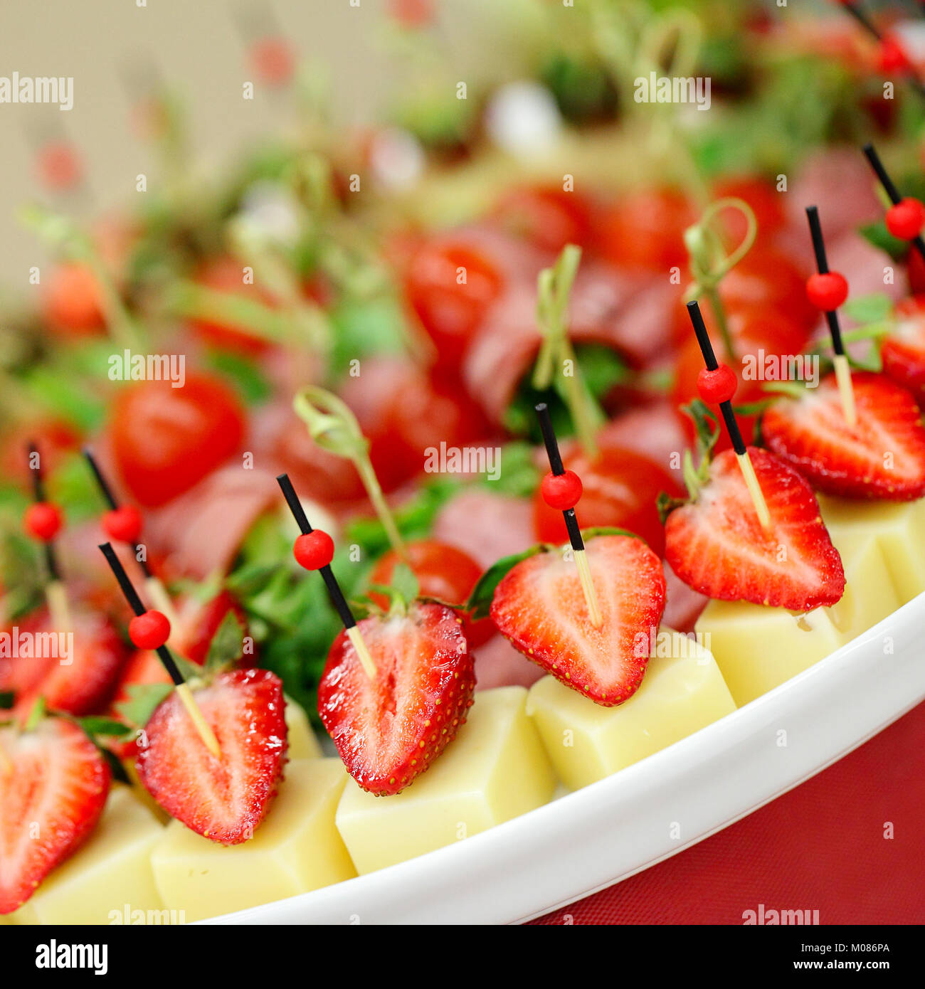 Appetizers, gourmet food - canape with cheese and strawberries ...