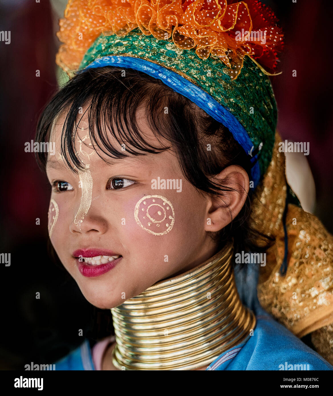 Portrait of long neck tribal girl wearing make up on her face, Chiang ...