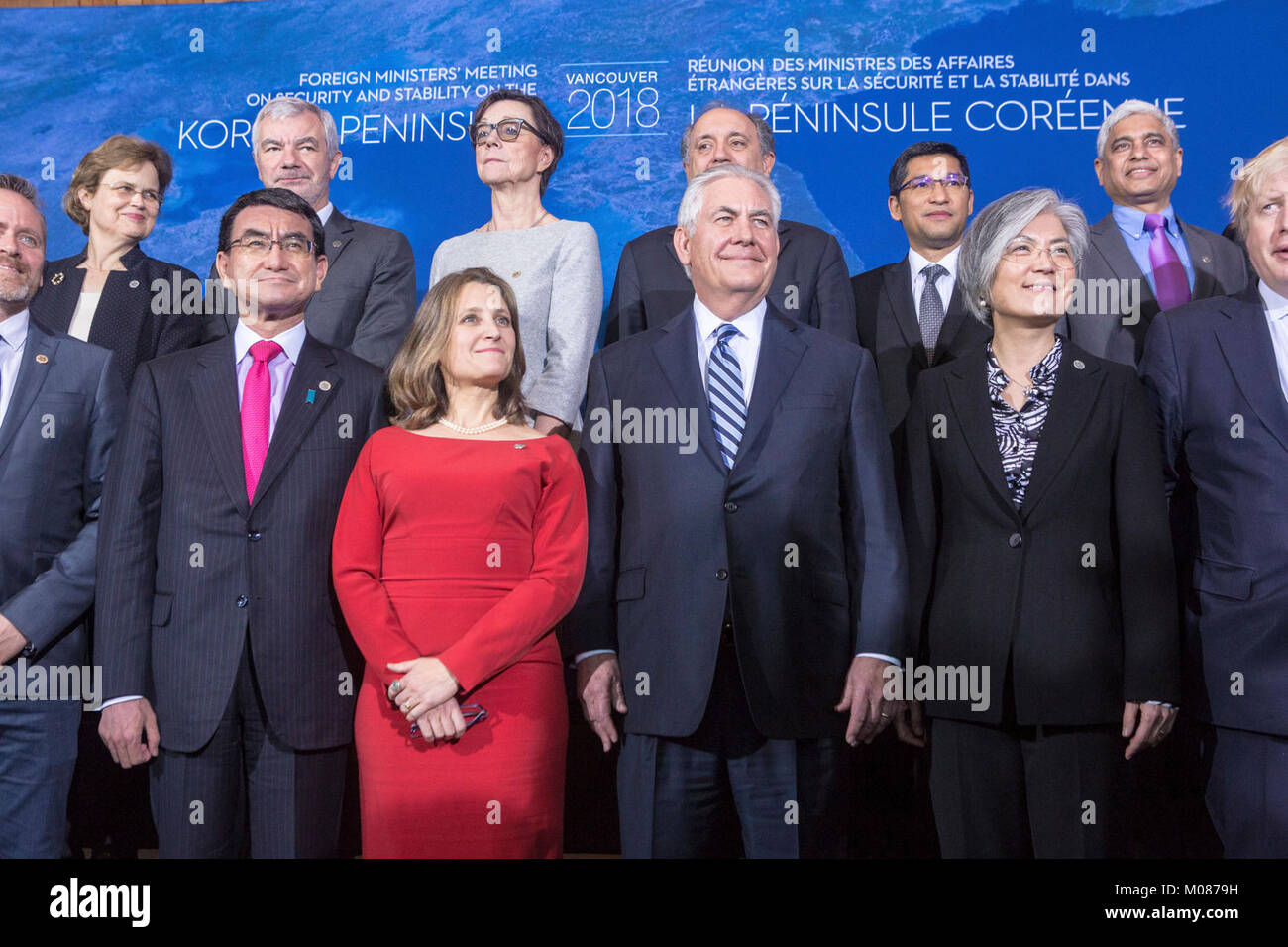 U.S. Secretary of State Rex Tillerson poses for a family photo with his ...