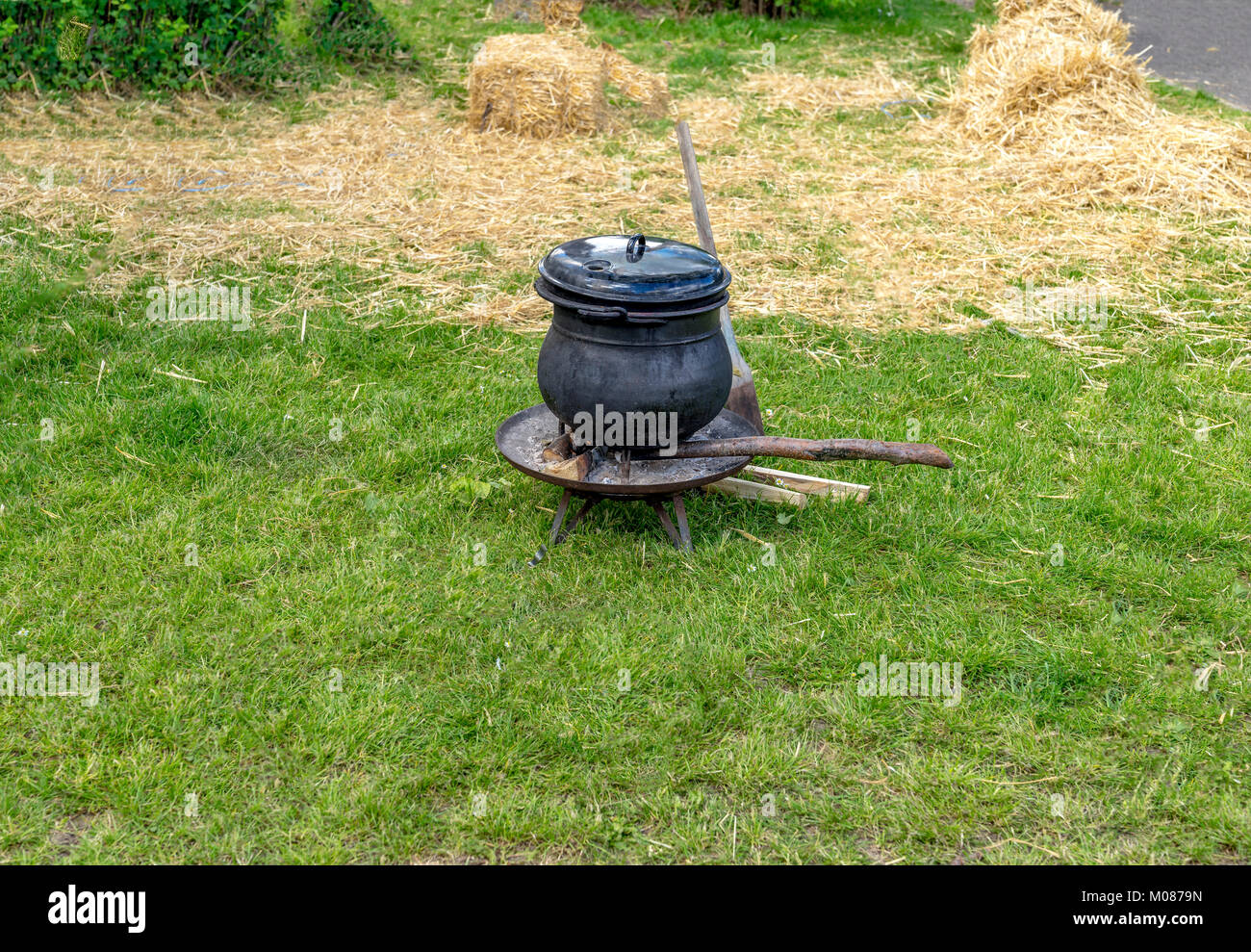 Large black kettle on a fire place Stock Photo - Alamy