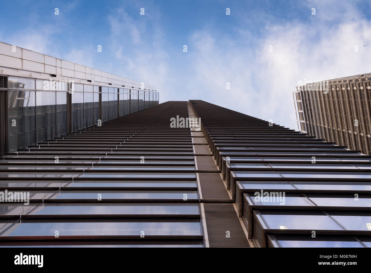 Skyscrapers from low angle view in city street Stock Photo - Alamy