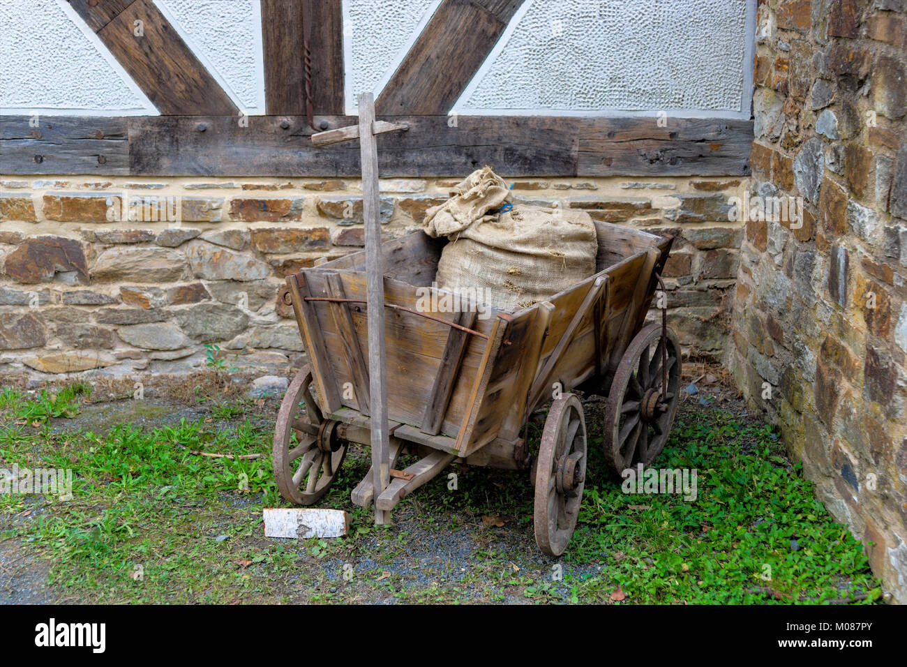 Ancient weathered wooden cart Stock Photo - Alamy