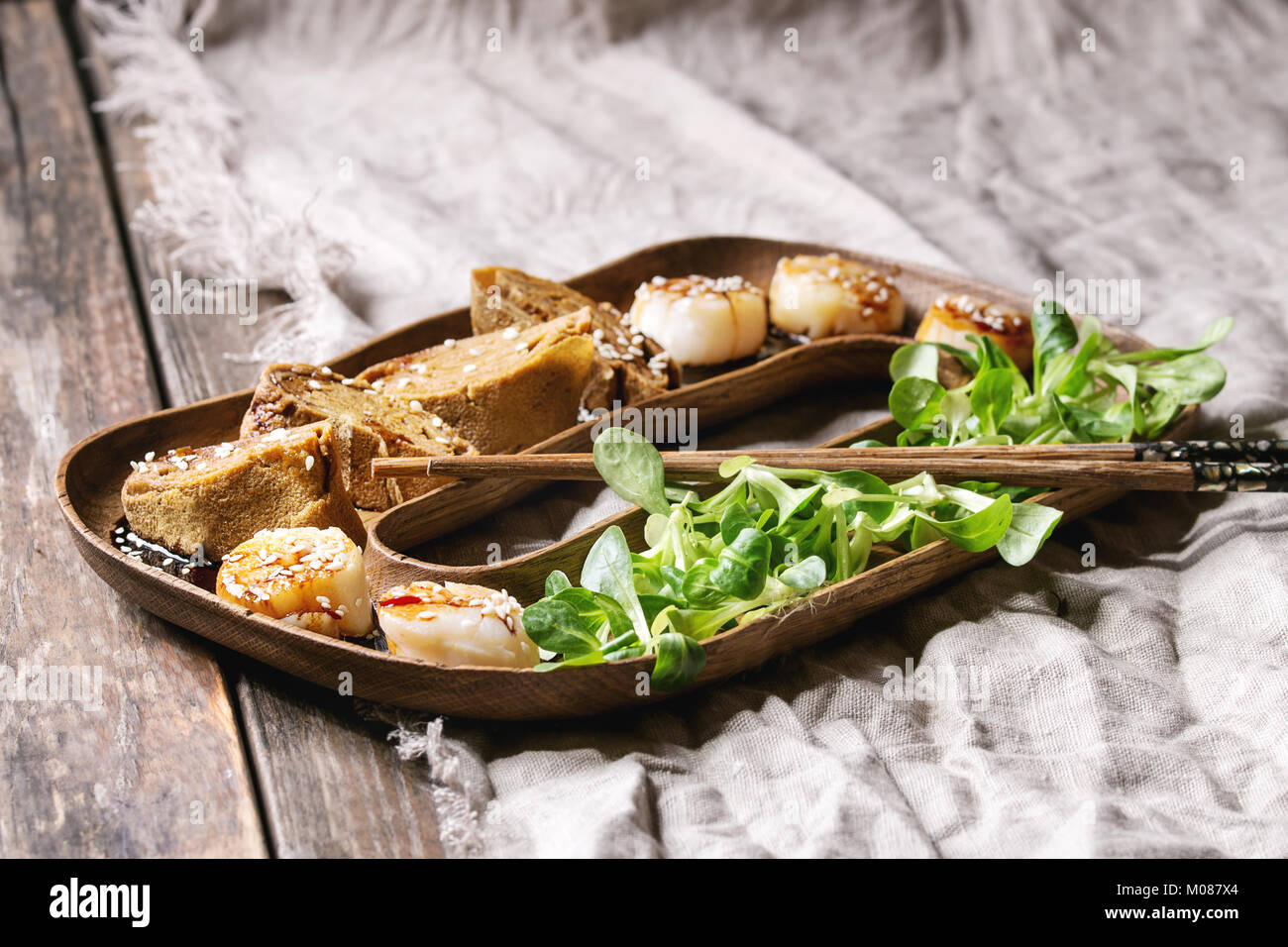 Asian style fried scallops Stock Photo - Alamy