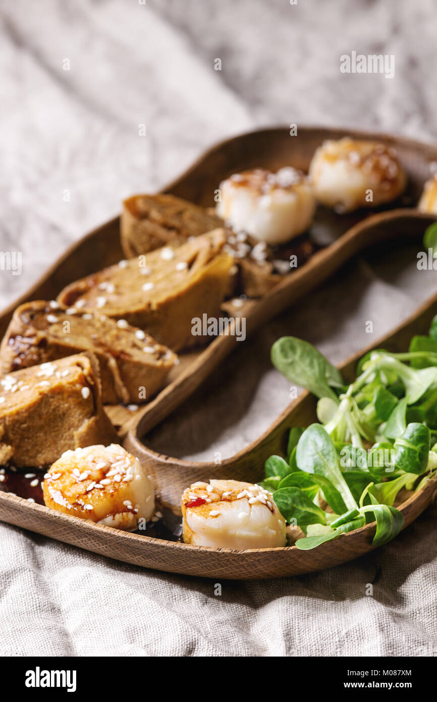 Asian style fried scallops Stock Photo - Alamy