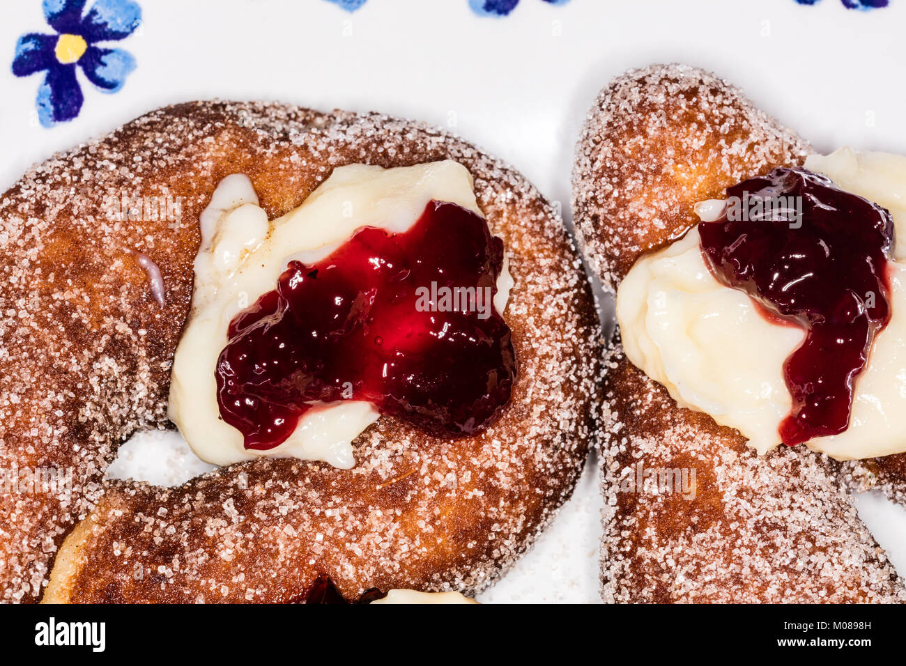 Graffa, neapoitan fried donut made with potato, cream and jam Stock ...