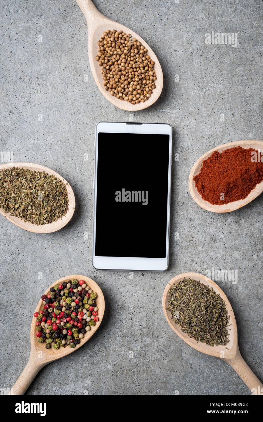 Mobile phone spoon wooden table hi-res stock photography and images - Alamy