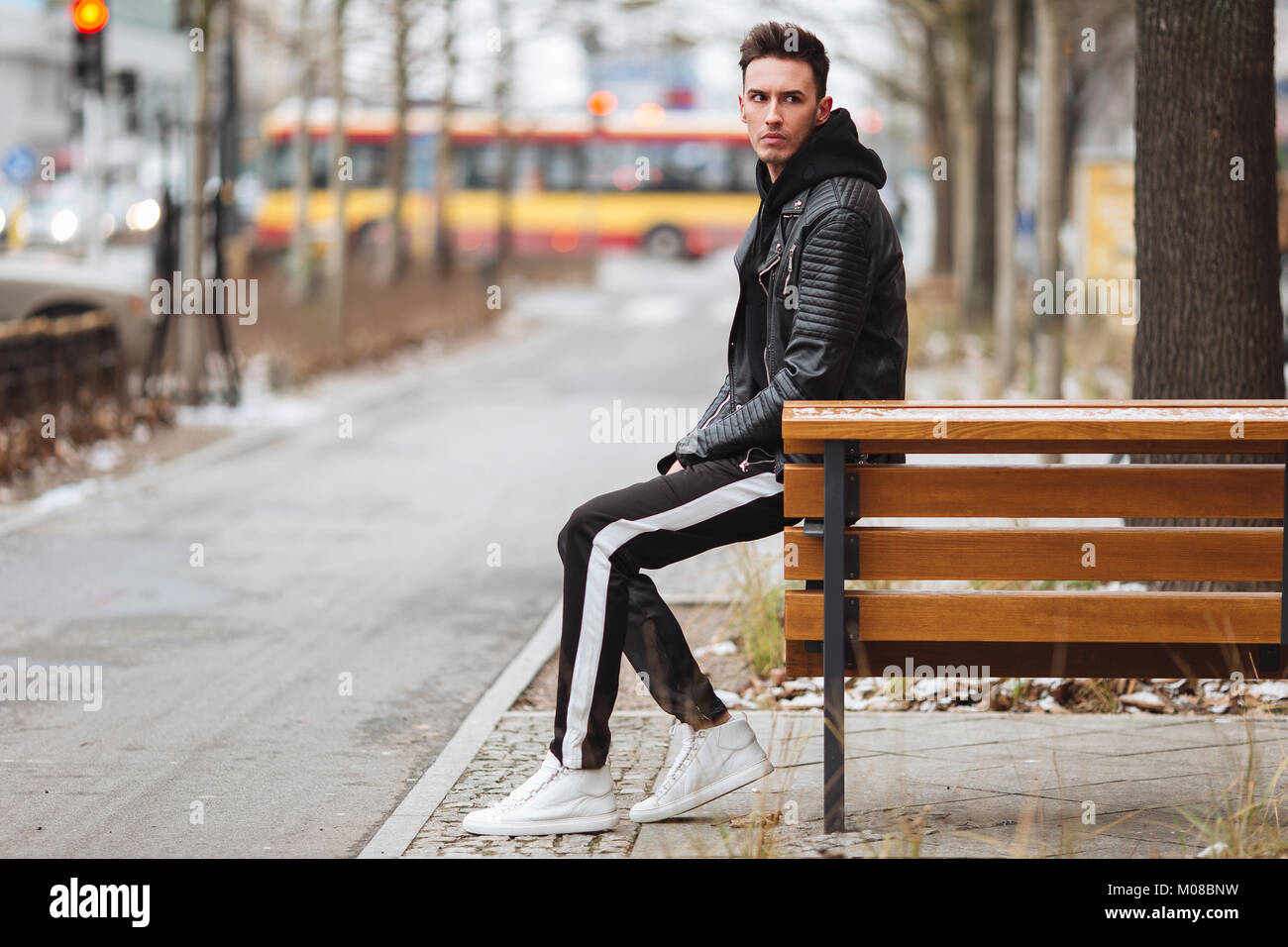 Male model posing on bench hi-res stock photography and images - Alamy