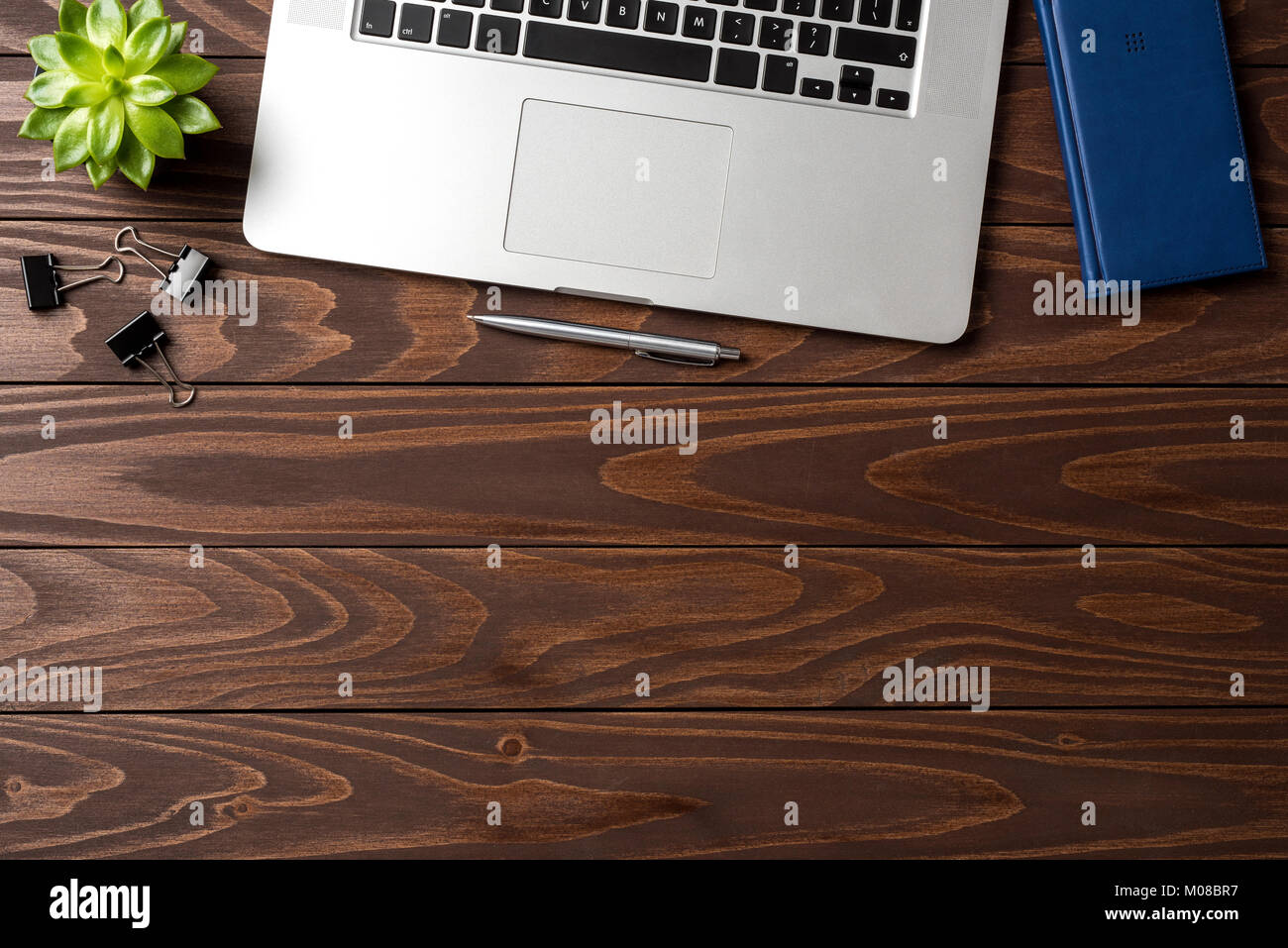 Overhead shot of wooden office desktop Stock Photo - Alamy