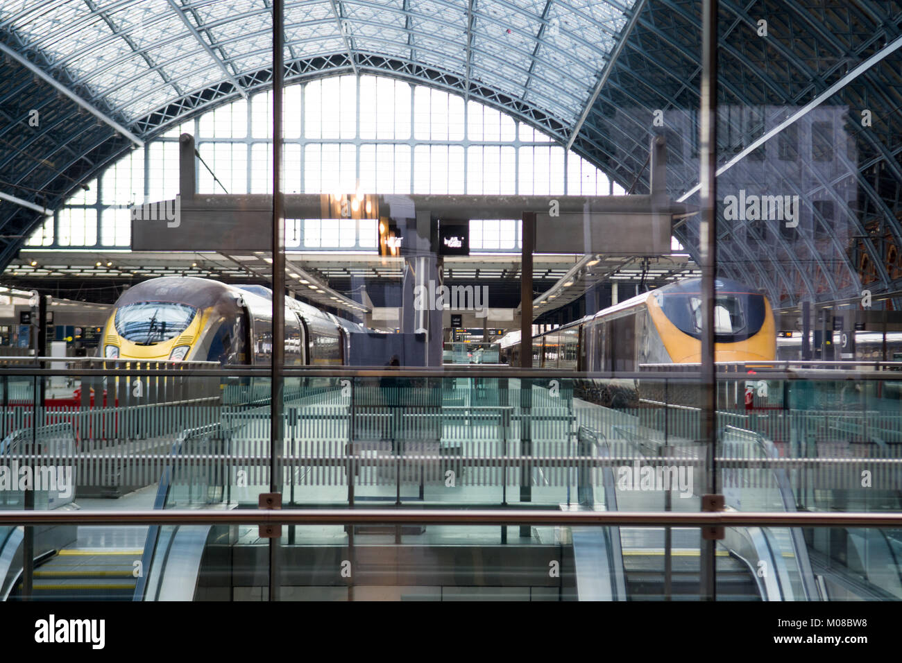 Modern railway platform in London with waiting trains Stock Photo - Alamy