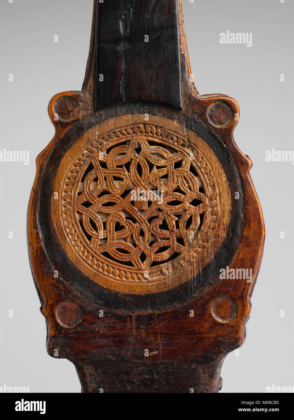 This mandora, a stringed musical instrument, represents historical ...