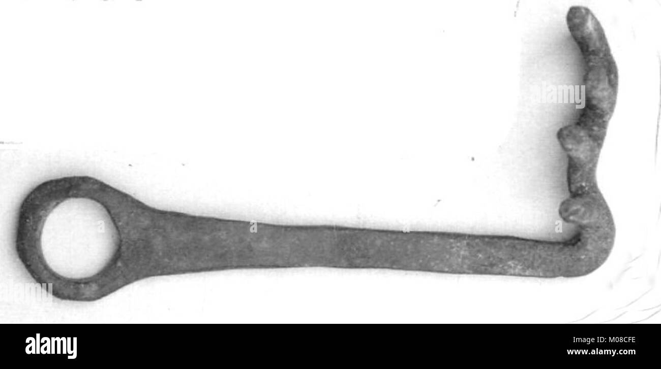 This historical key is a simple yet significant artifact. It serves as ...