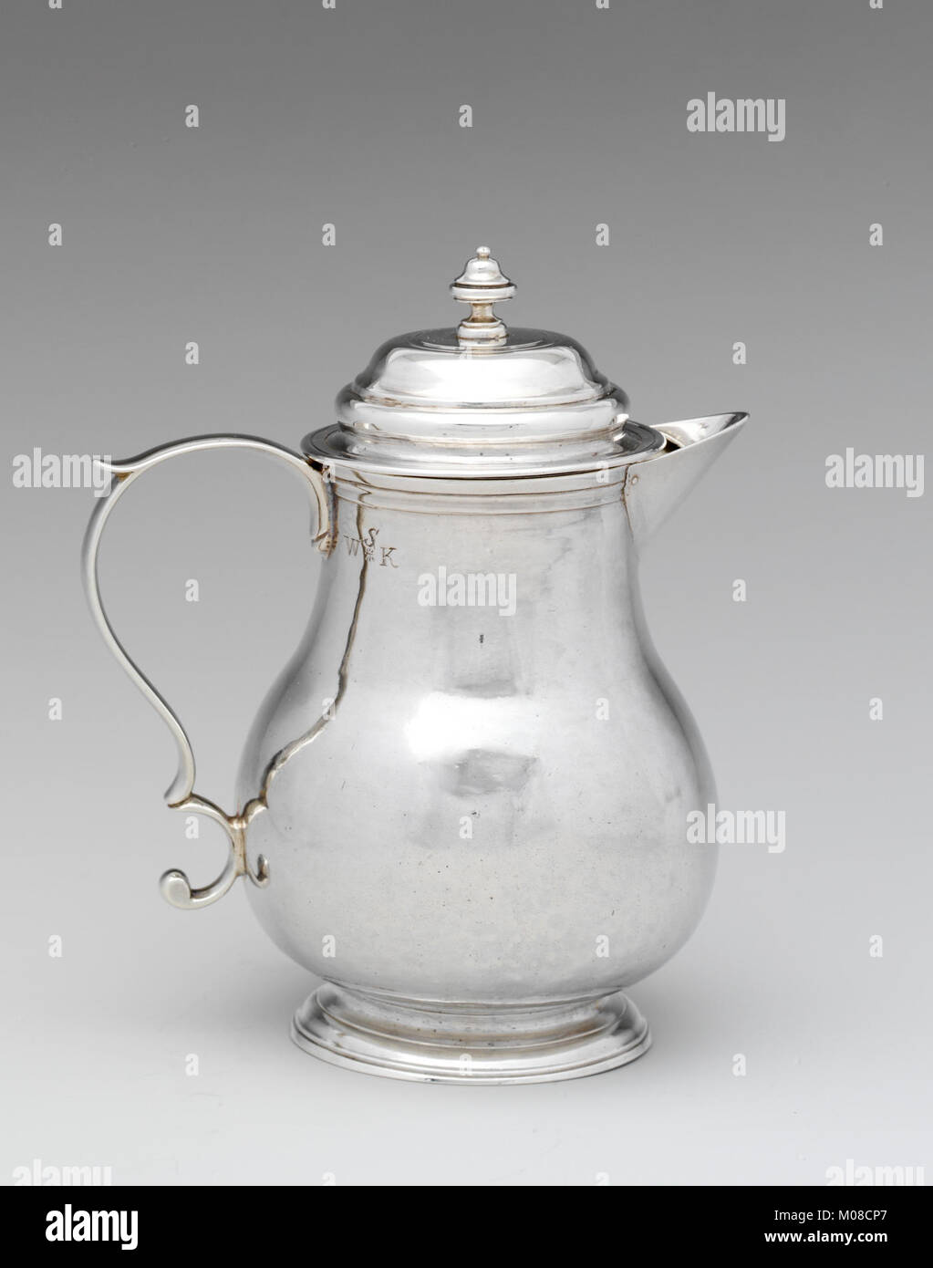 A ceramic milk pot, representative of everyday utilitarian objects. The ...