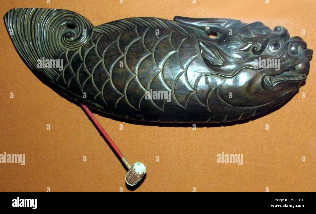 This mokugyo is a traditional Japanese wooden percussion instrument ...