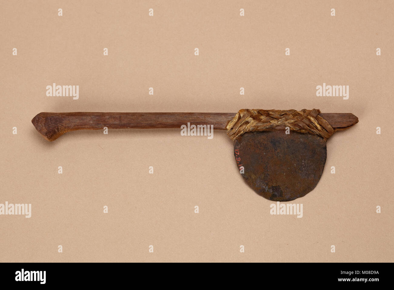 This model of an ax is a historical representation of a weapon used in ...