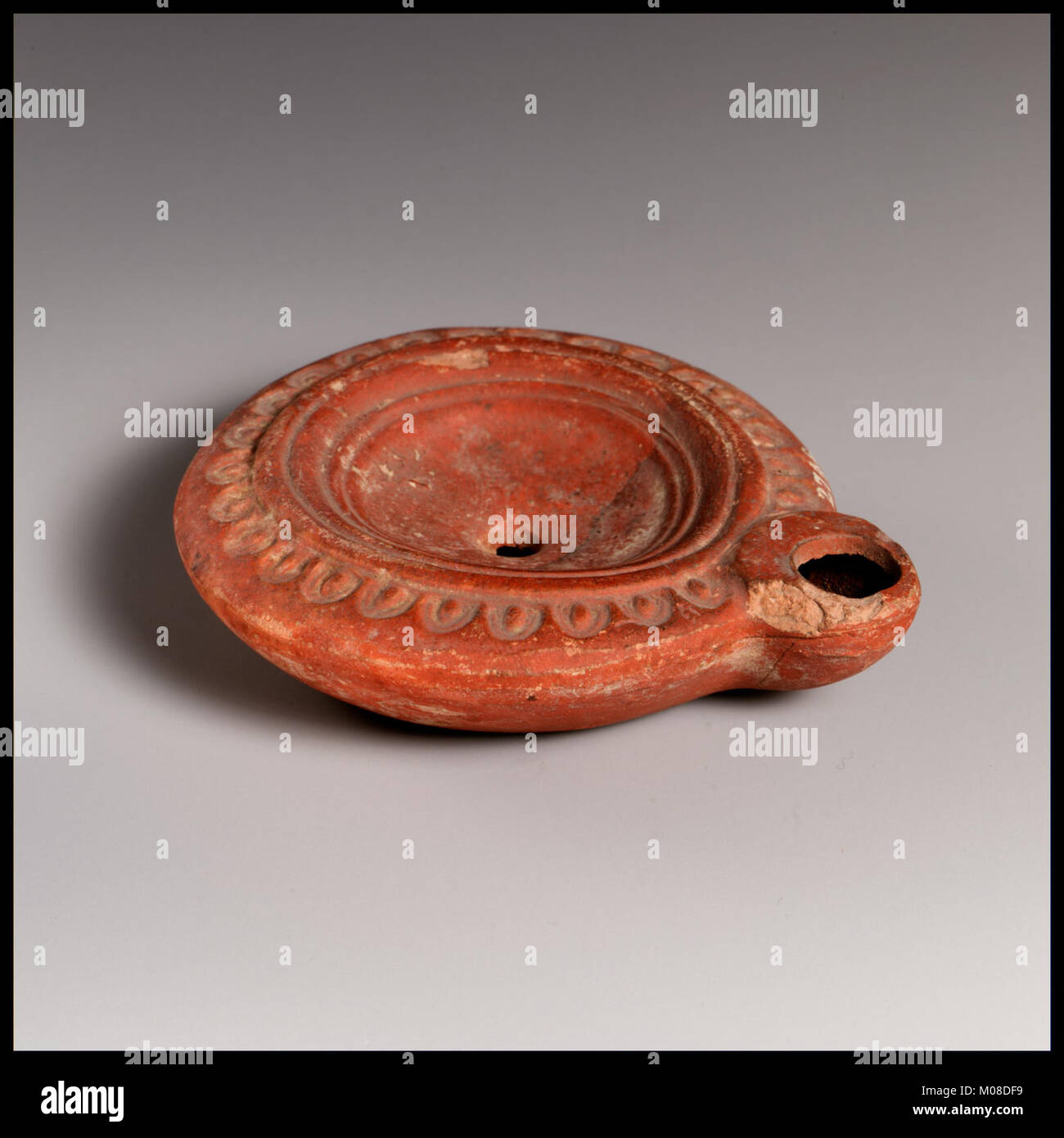 This lamp is an example of historical lighting design. It showcases the ...