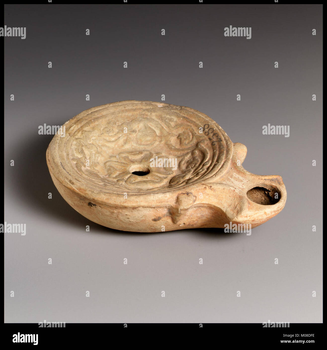This lamp, part of the museum's collection, is a fine example of ...