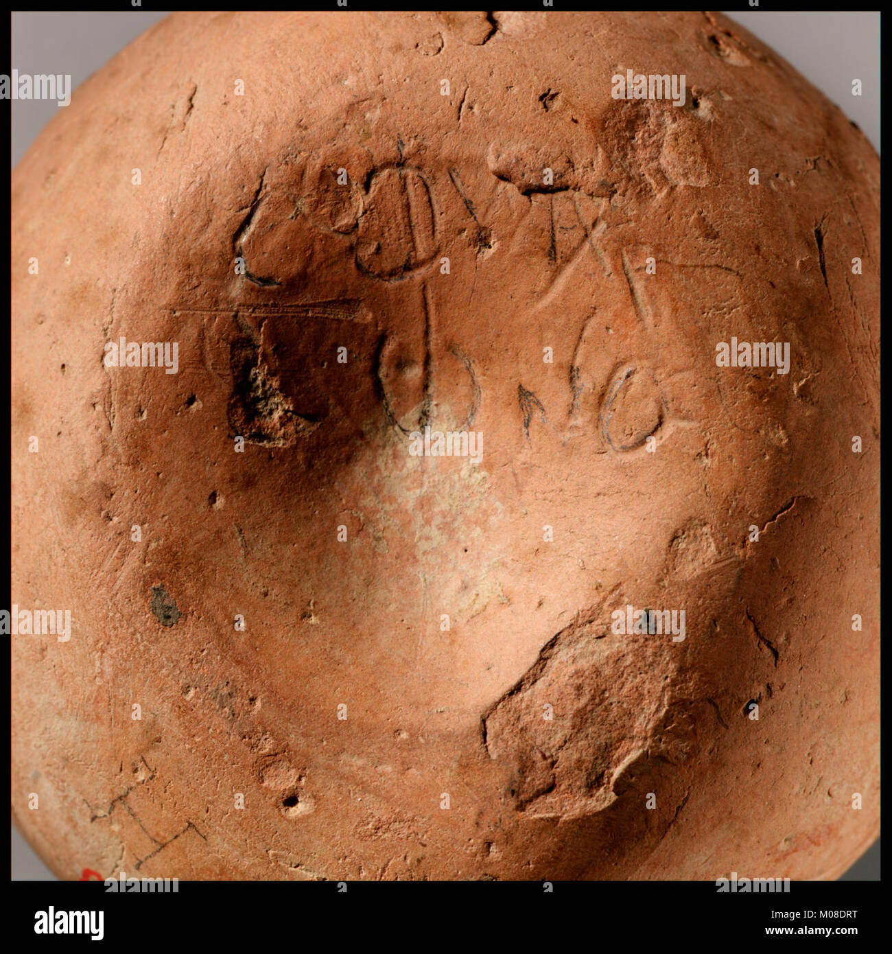 This ancient lamp, a functional artifact from the past, showcases the ...