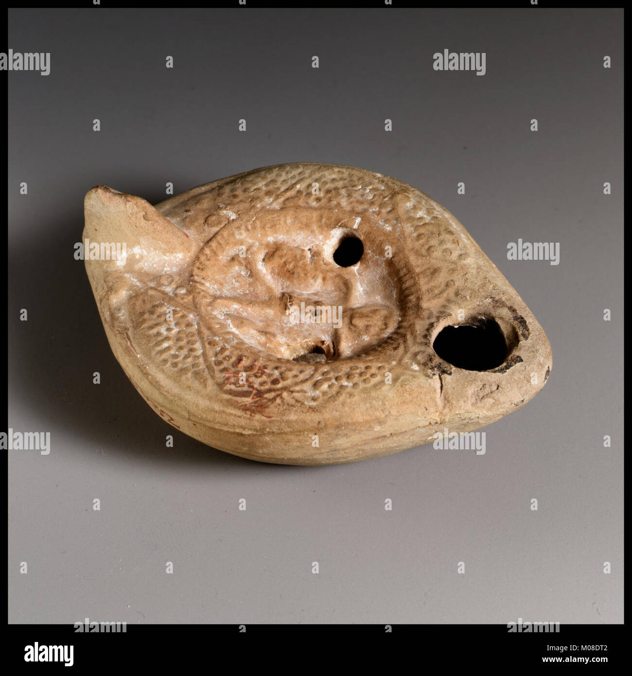 A historical lamp, crafted from materials typical of the era, designed ...