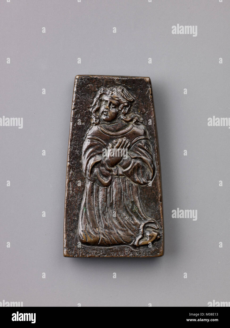 Kneeling figure in submission hi-res stock photography and images - Alamy