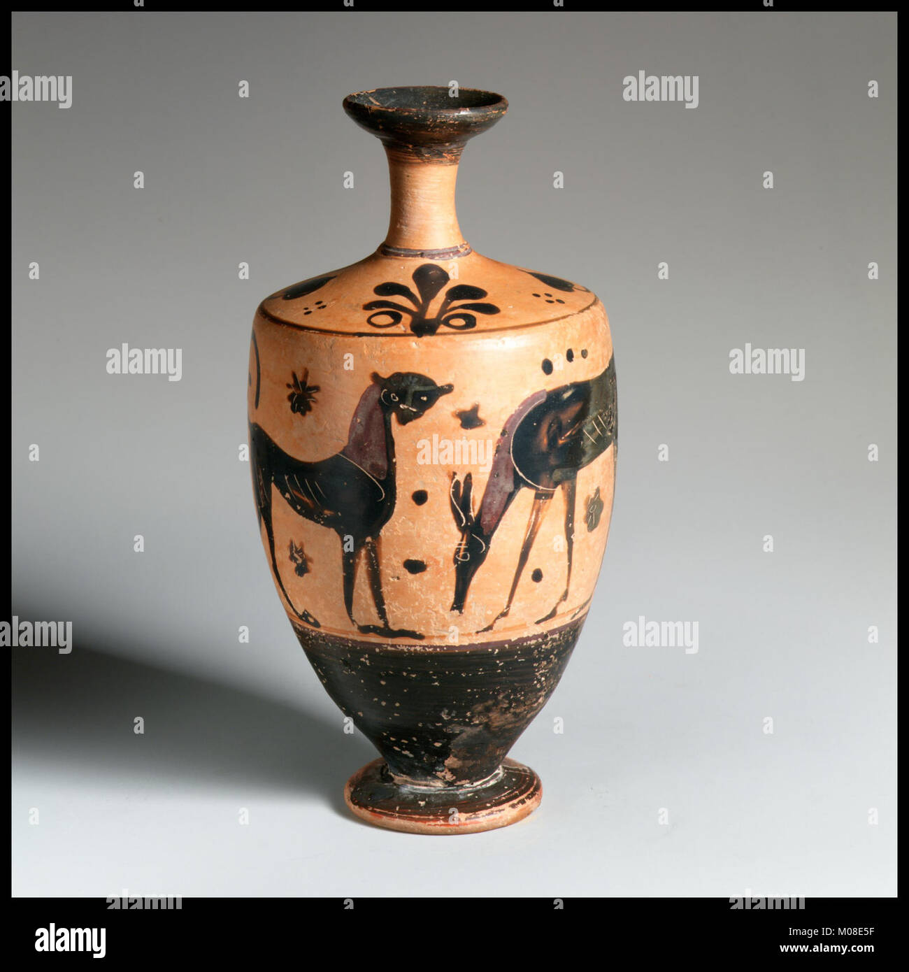 This lekythos, a type of ancient Greek pottery, features a distinct ...