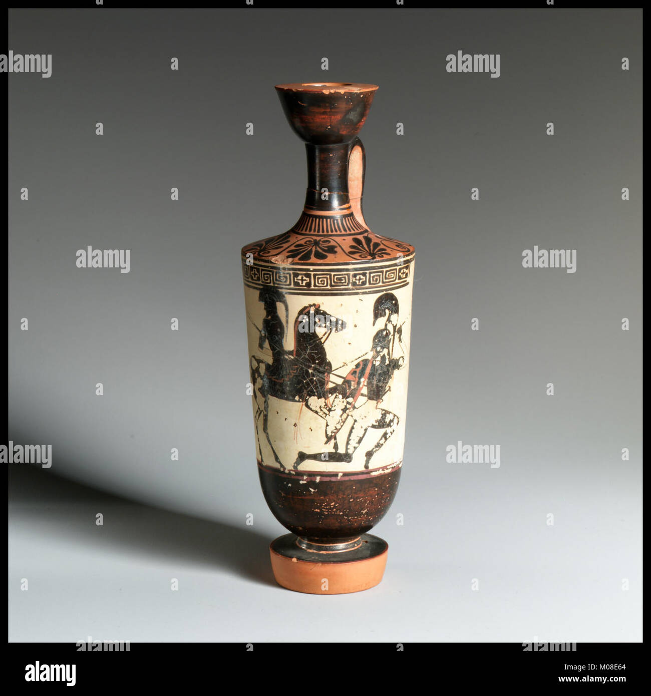 This lekythos, a type of ancient Greek pottery, features a narrow neck ...