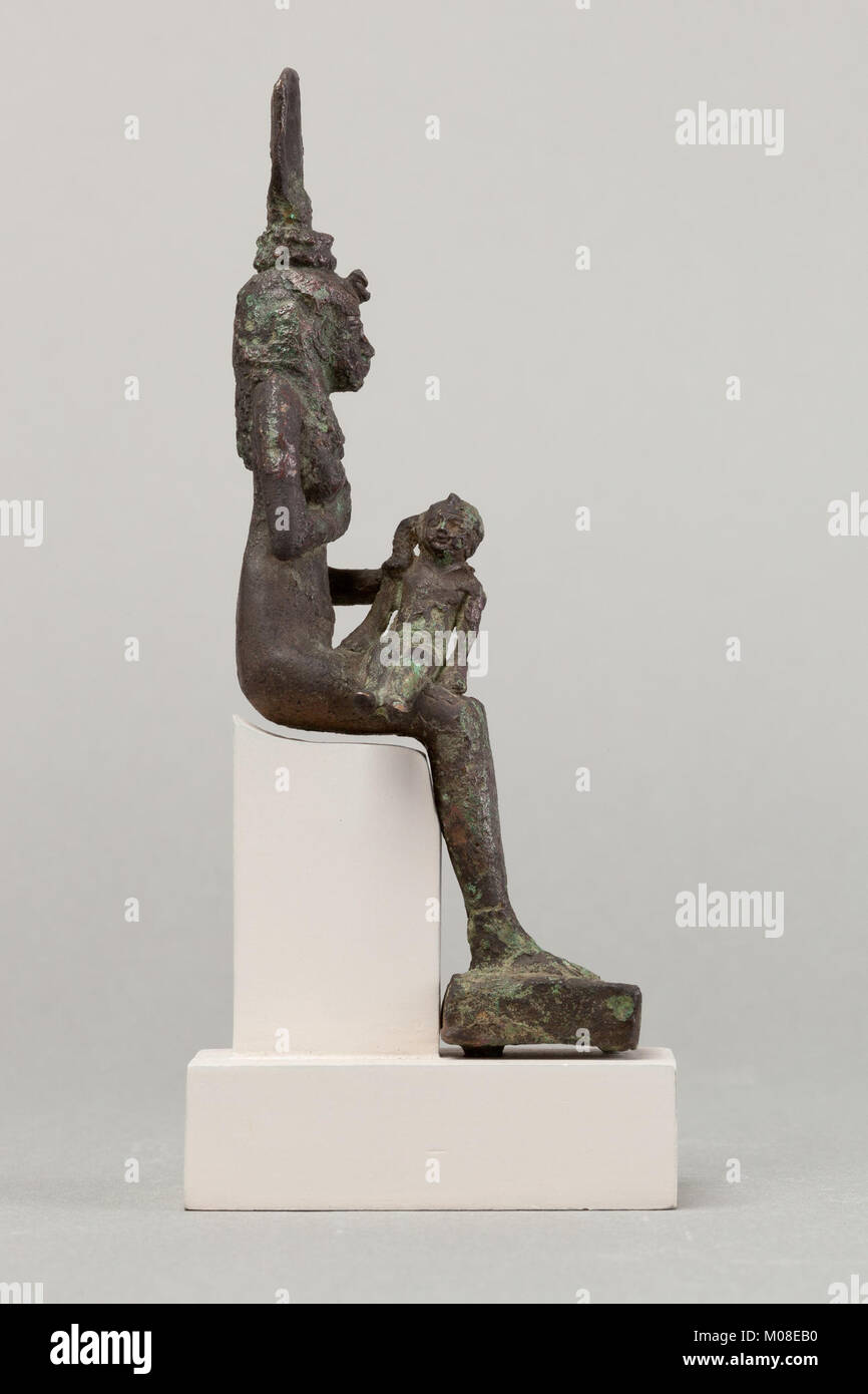 A representation of Isis and Horus, key figures in Egyptian mythology ...