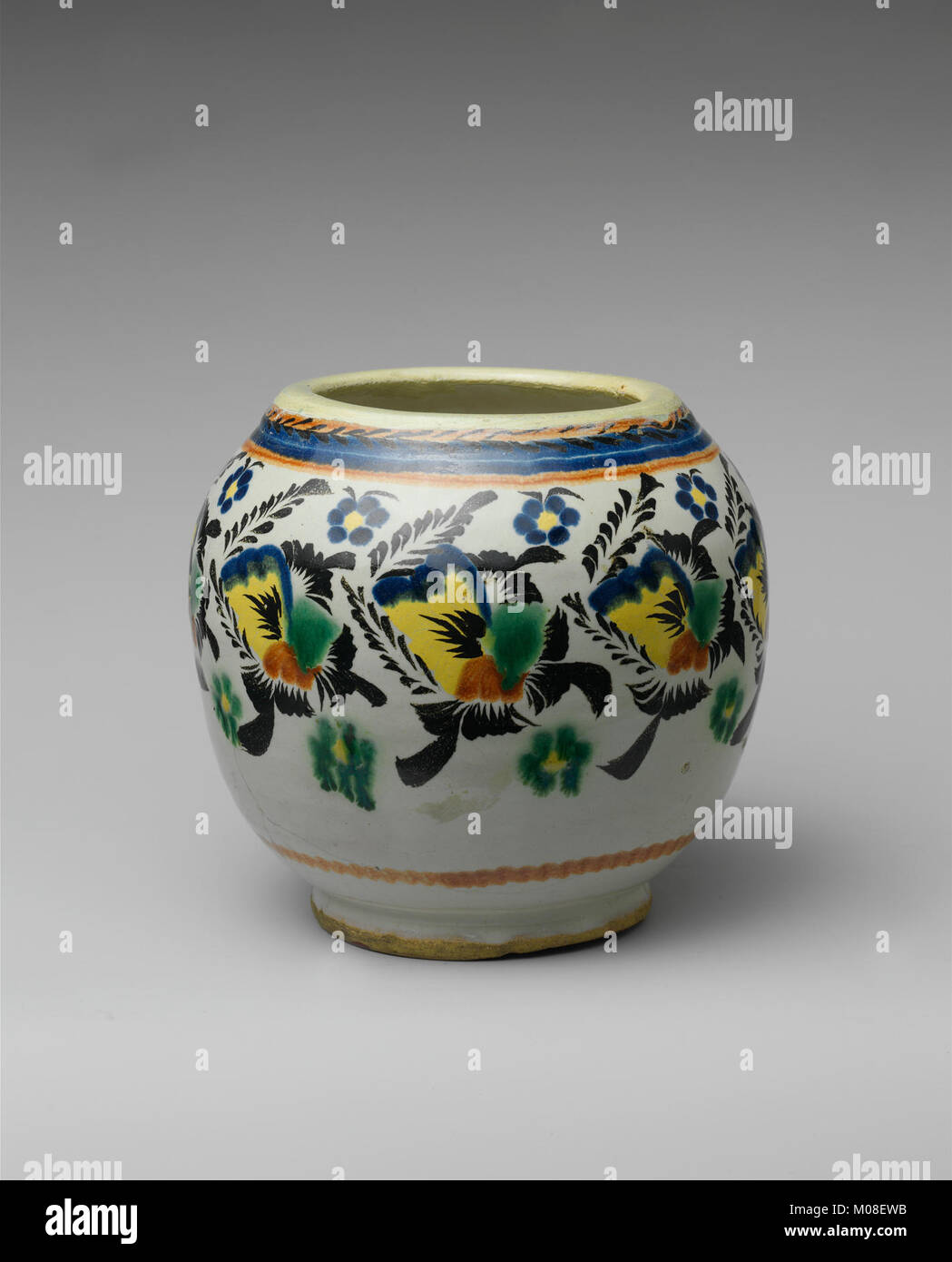 A ceramic jar, details unspecified. Medium: Ceramic. Dimensions: Not ...