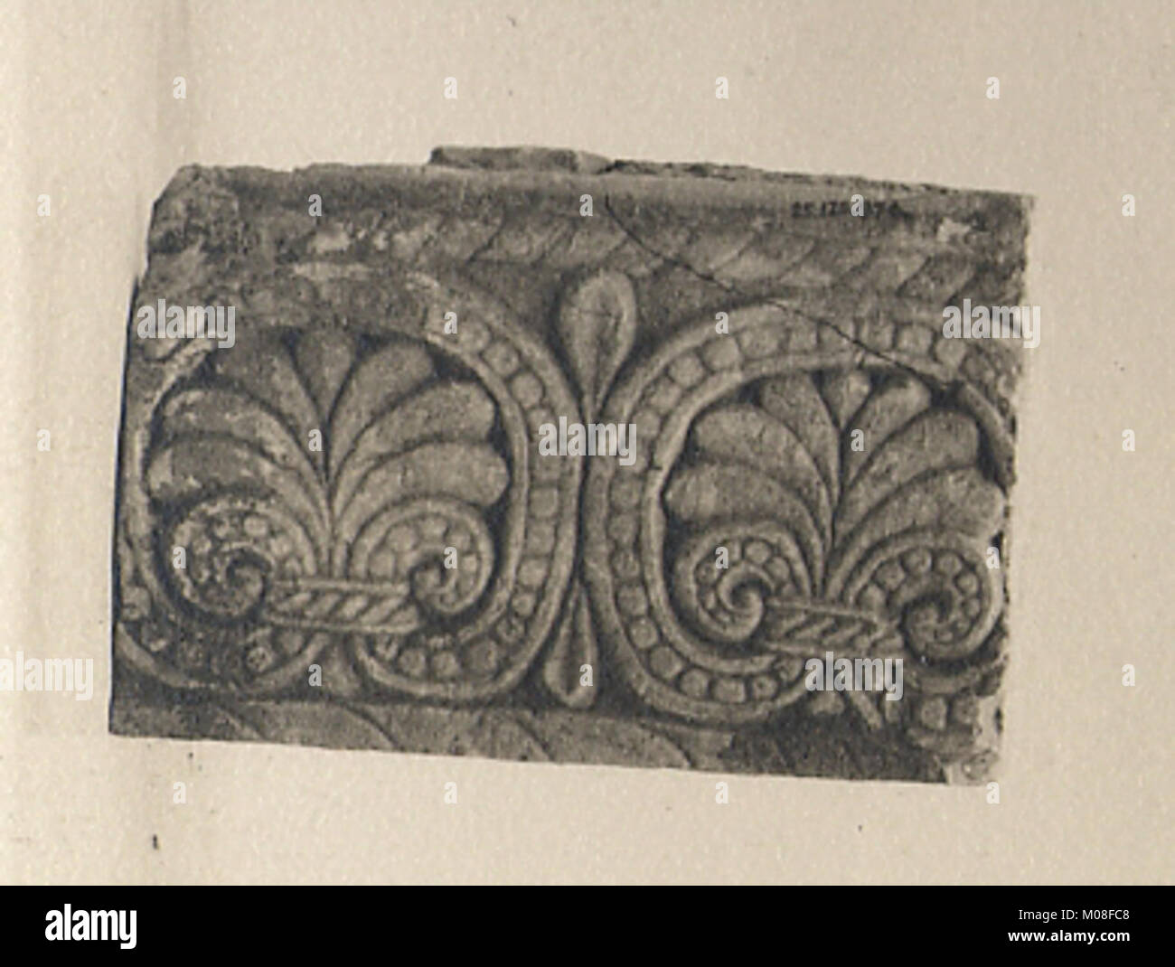 This architectural element is a lintel, serving as a horizontal support ...