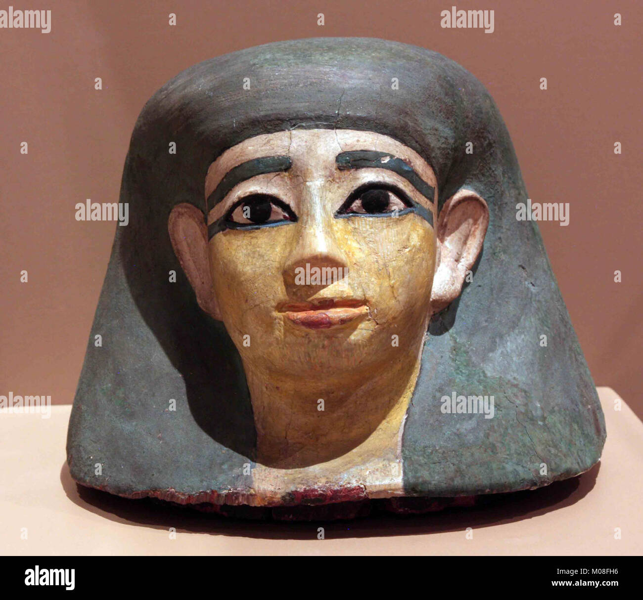 This lid, from a canopic jar, was used in ancient Egyptian burial ...