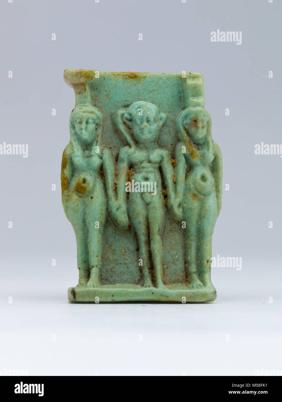 This amulet features Nephthys, Horus, and Isis, three important deities ...