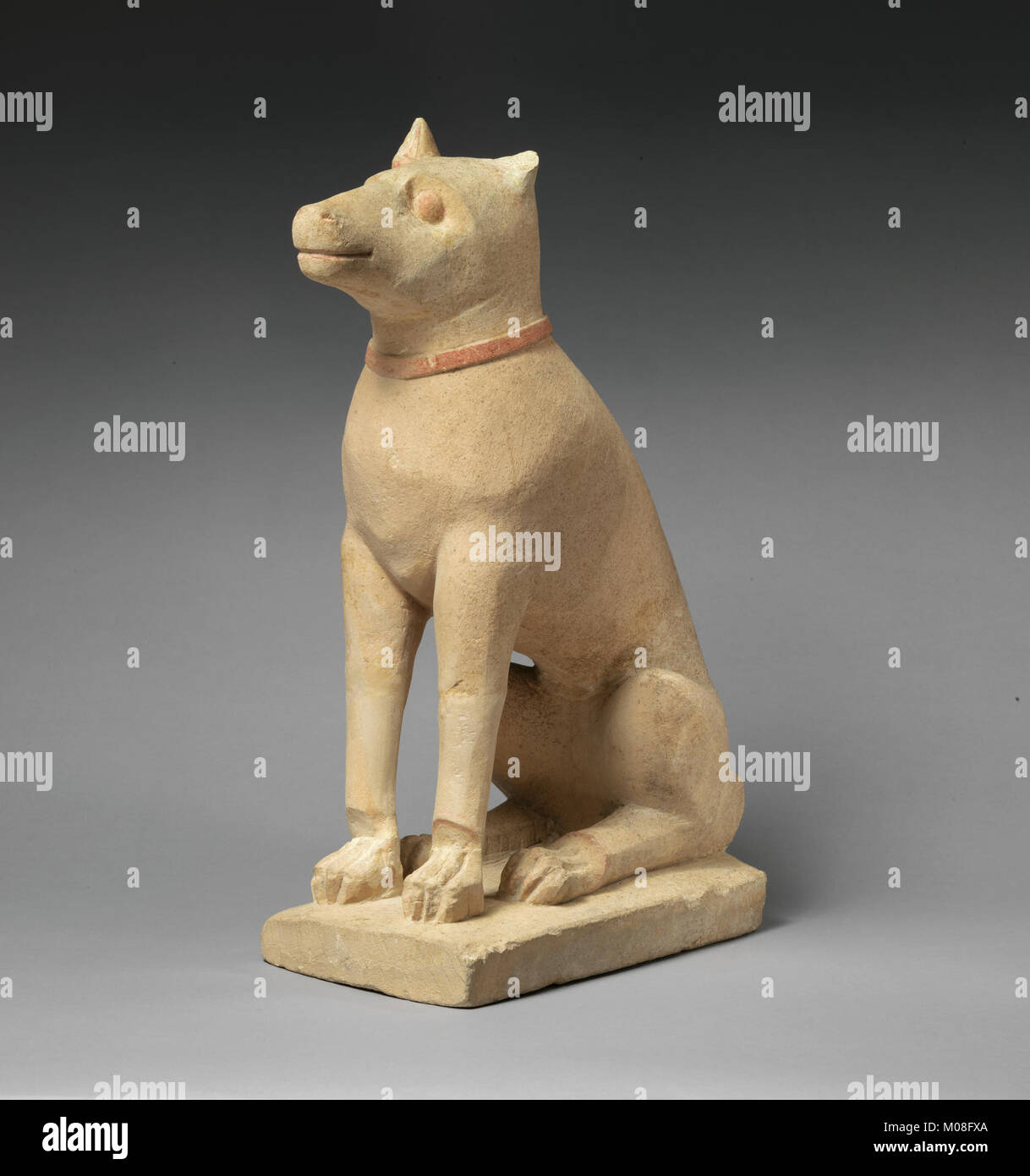 This limestone sculpture depicts a dog, illustrating ancient artistic ...