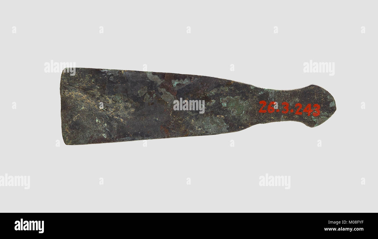 This model of an adze blade, crafted for display, illustrates the shape ...