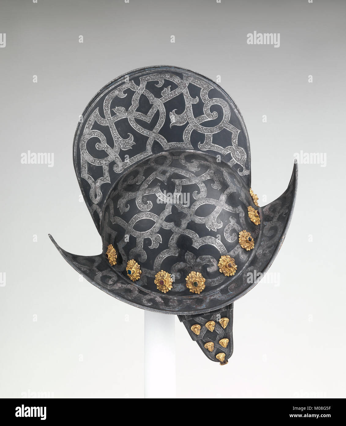 A 16th-century morion helmet from the MET collection, featuring a crest ...